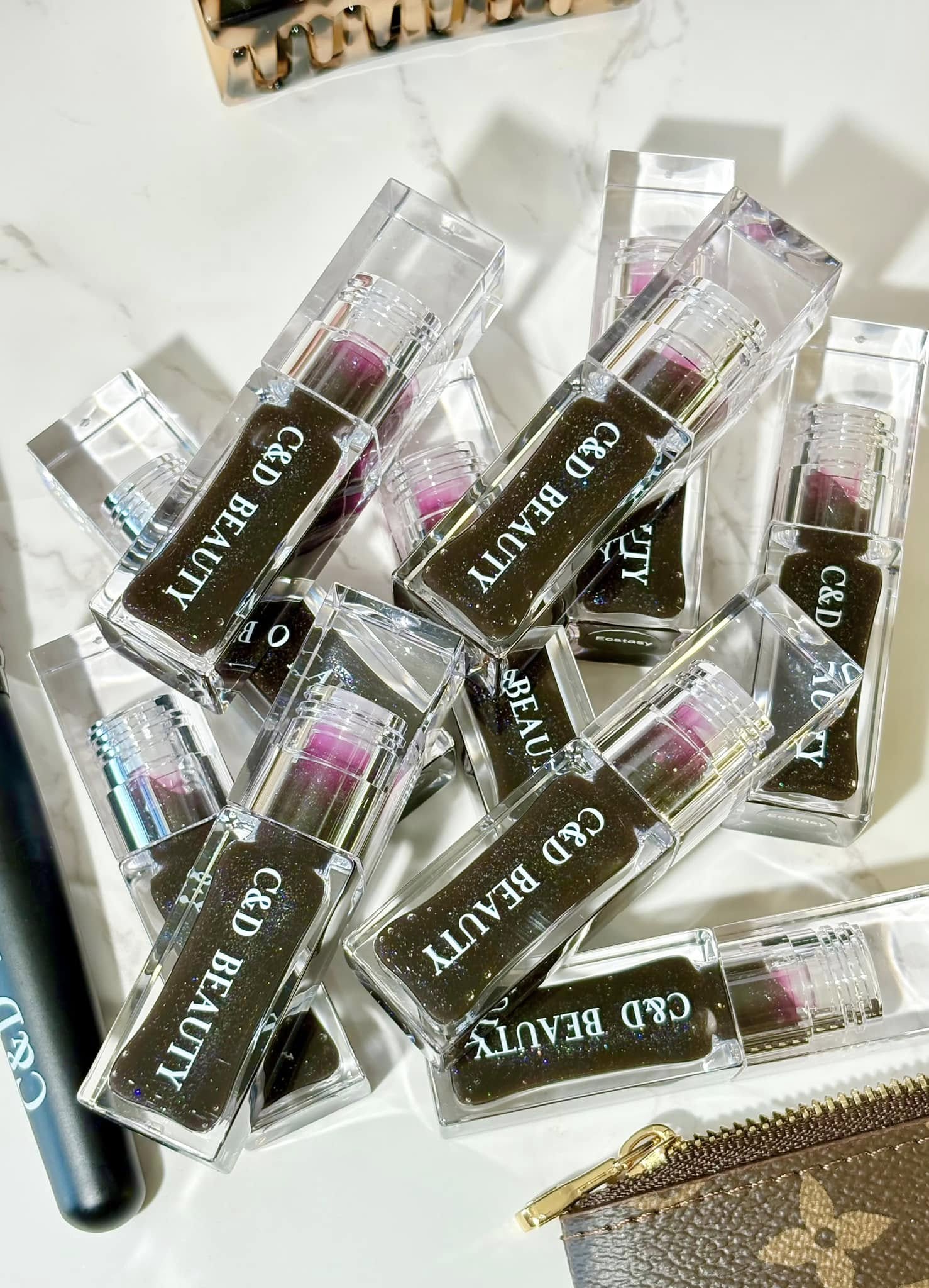 ECSTACY LIP OIL – MOCO Boutique